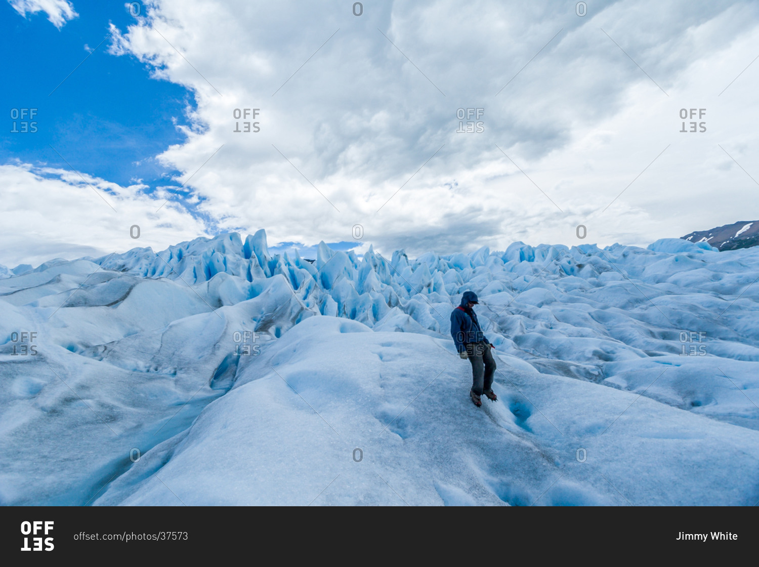 Man standing on Glacier in Los Glaciares National Park, Patagonia ...