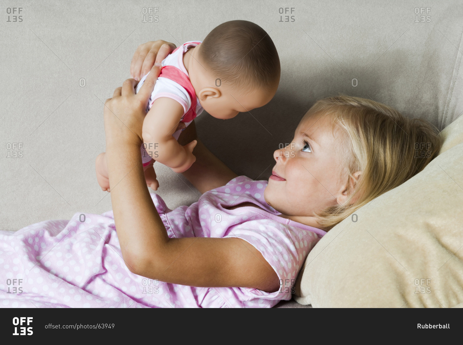 Little Girl Playing With Baby Dolls