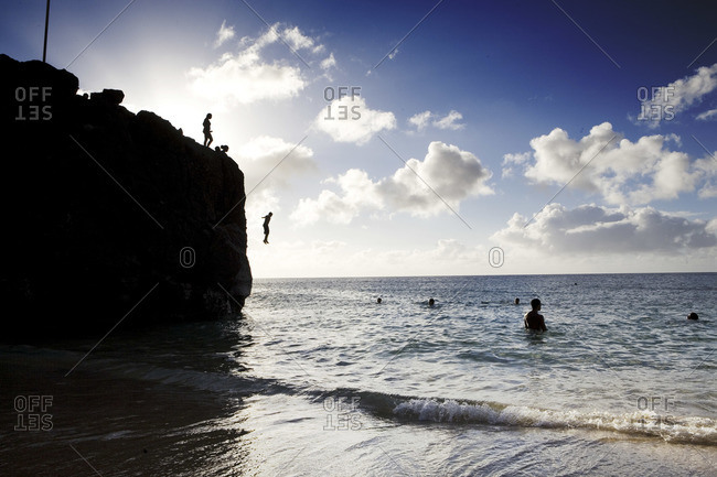 Person Jumping Off Cliff Silhouette