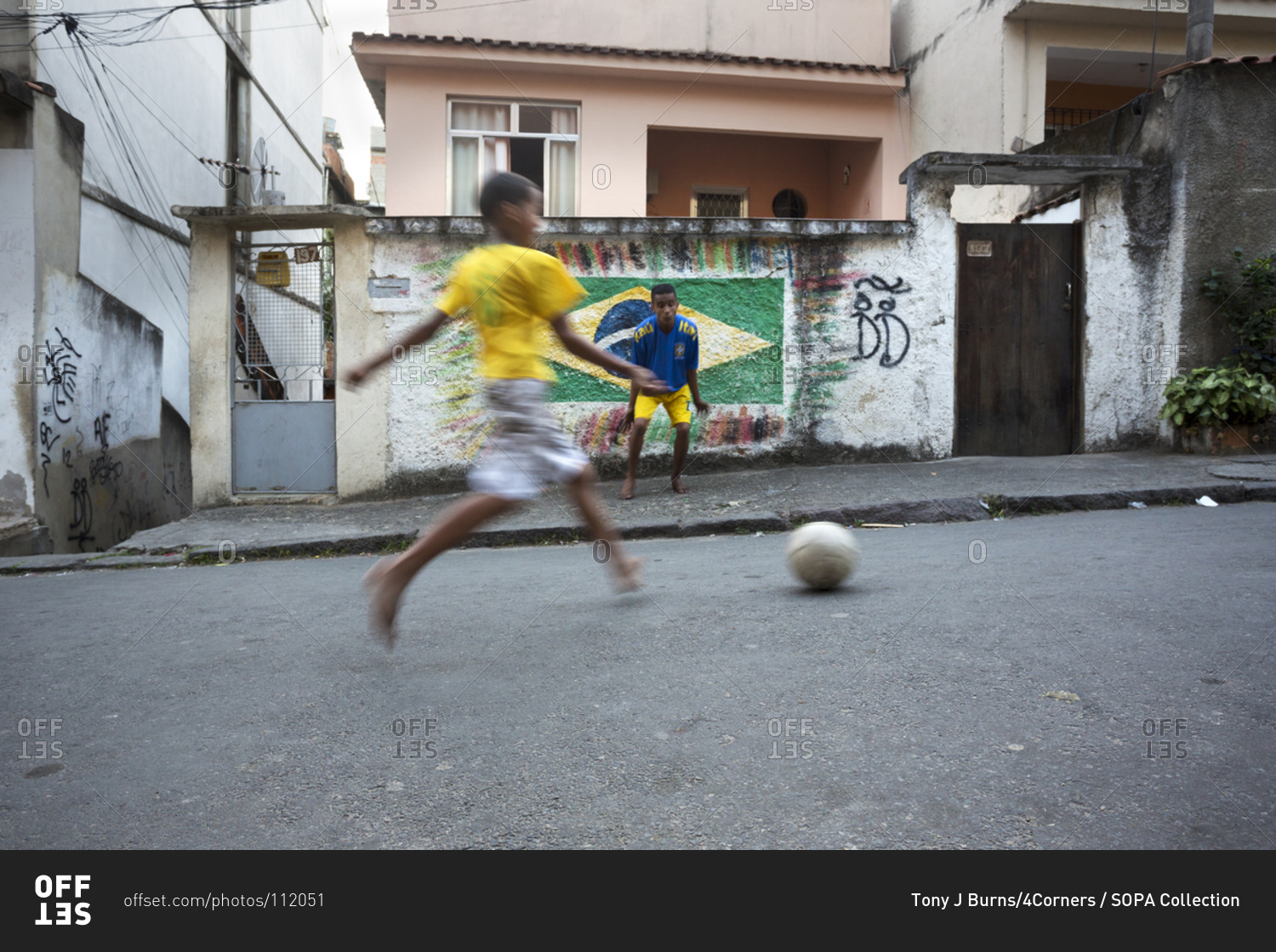 Kids Playing Soccer In The Streets