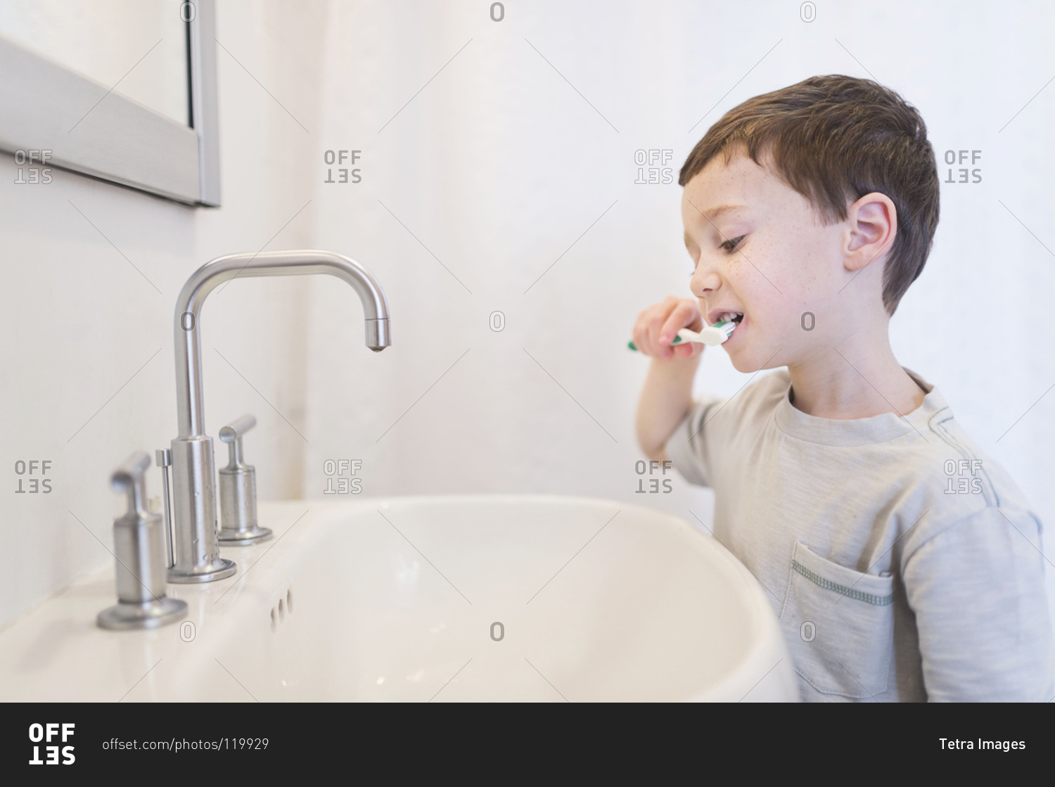 Boy brushing teeth - Offset Collection stock photo - OFFSET