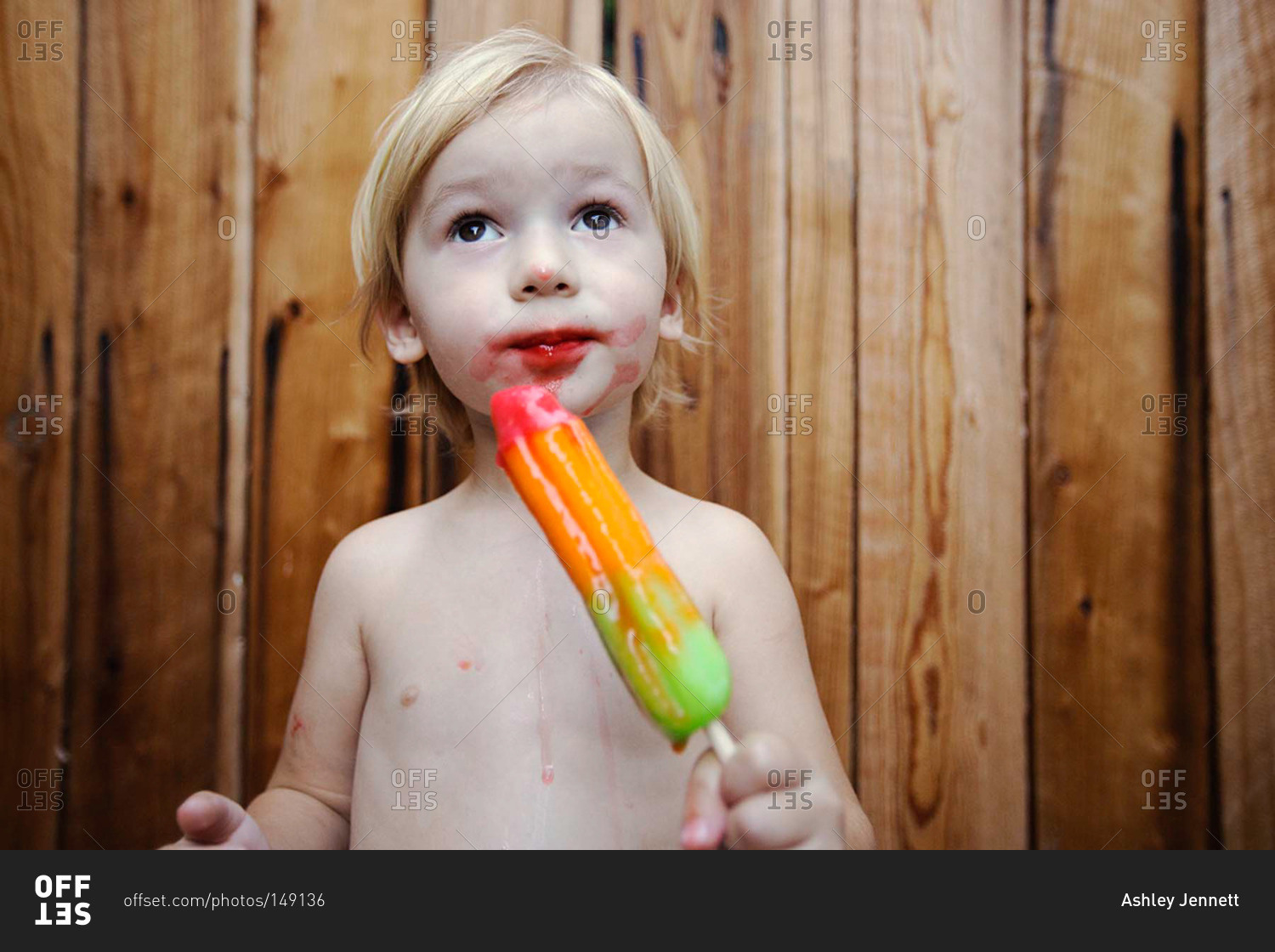 Little boy eating popsicle - Offset stock photo - OFFSET