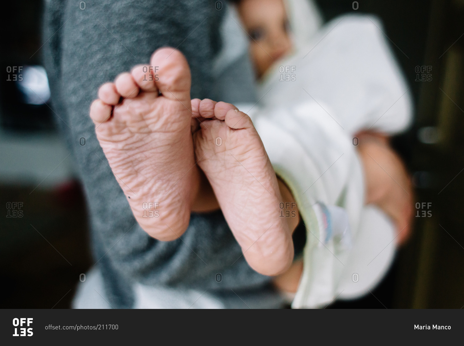 A little girl's wrinkled toes after a bath stock photo - OFFSET