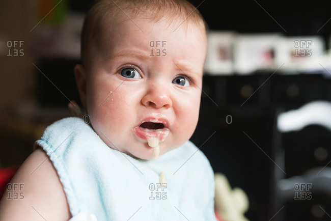 child drooling stock photos - OFFSET