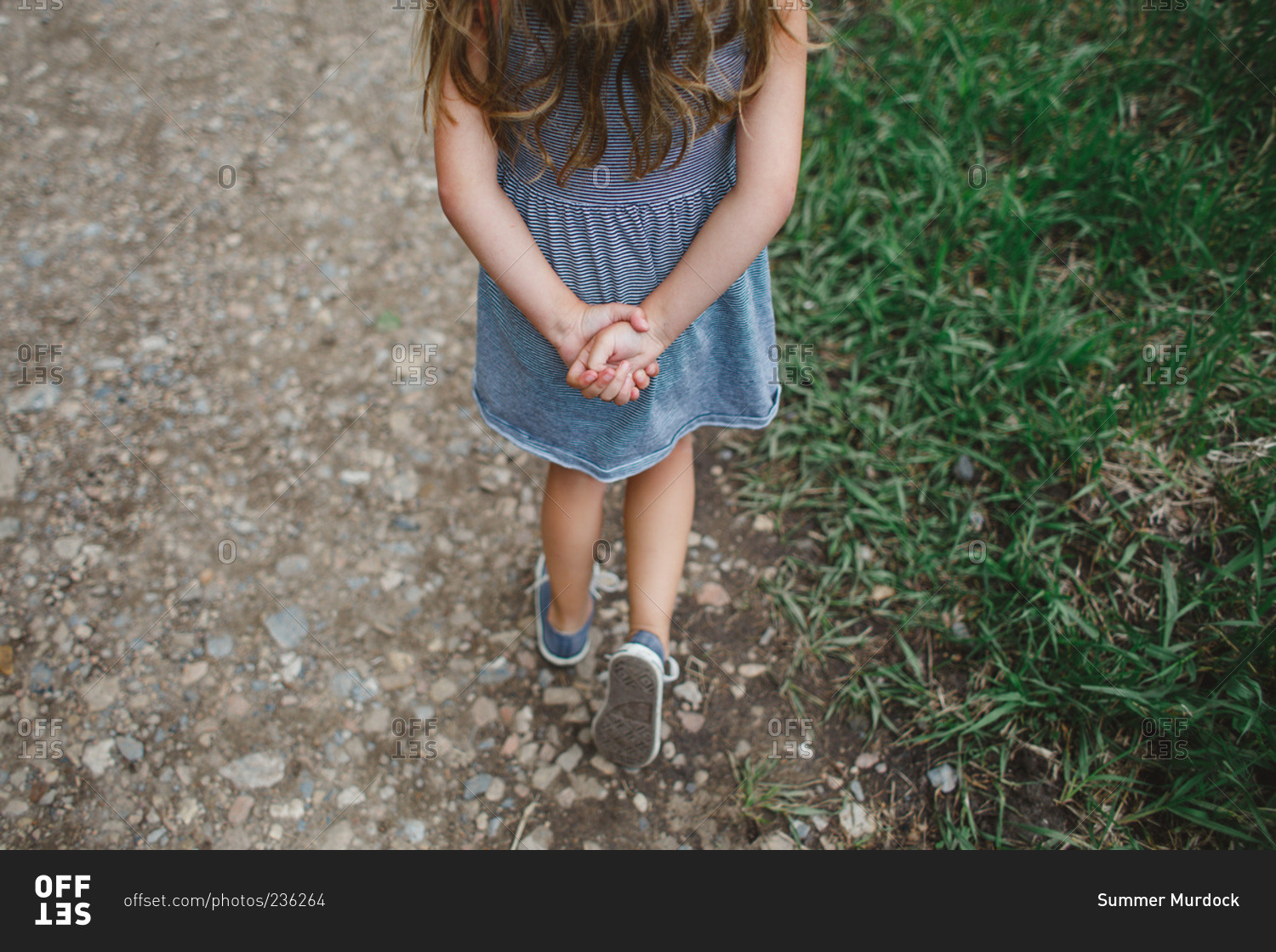 Students Walking In Line Hands Behind Back