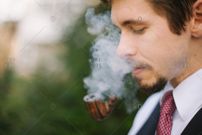 Man Smoking Pipes
