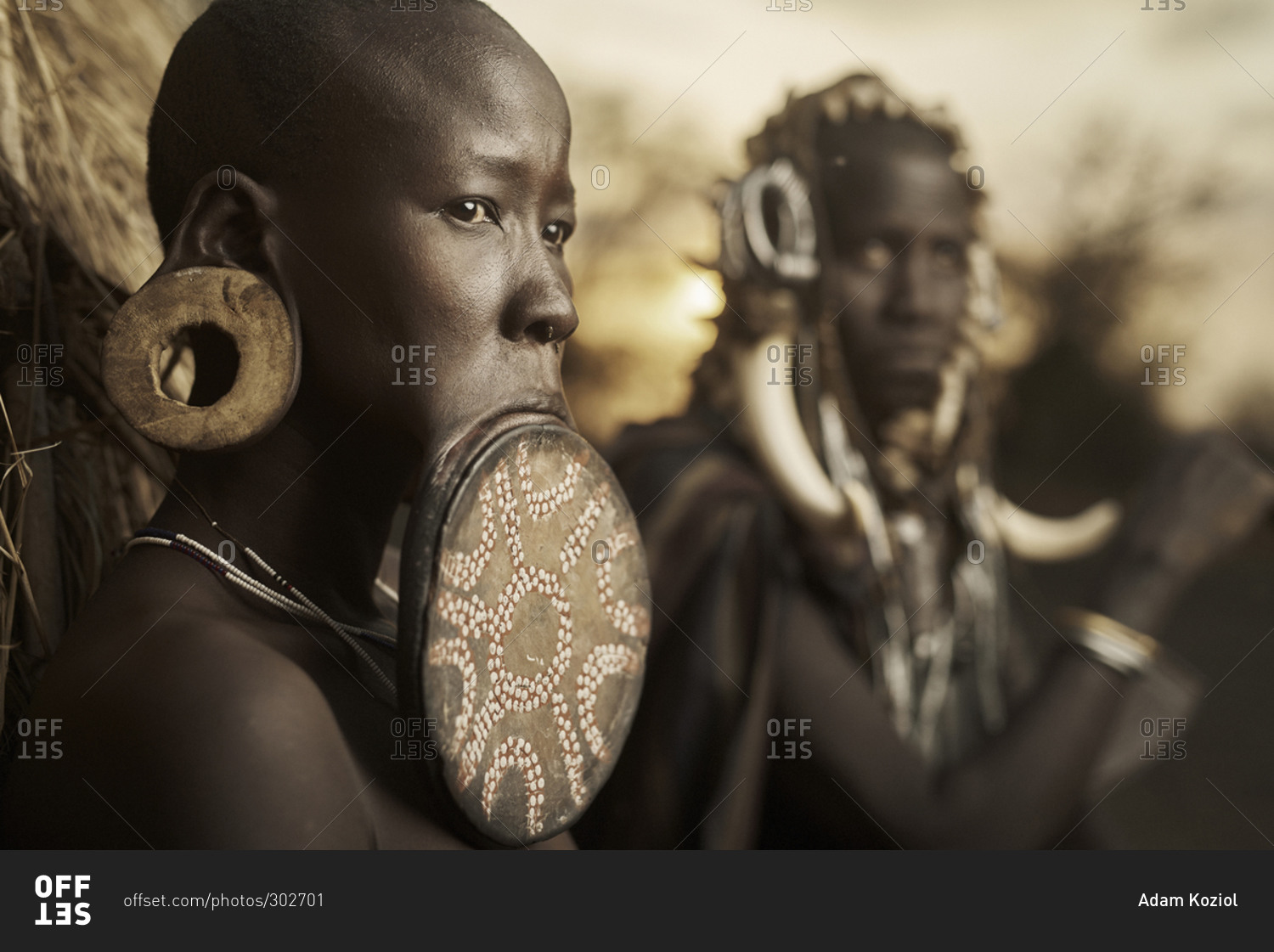February 20, 2015: Woman with large wooden lip plate and stretched ...