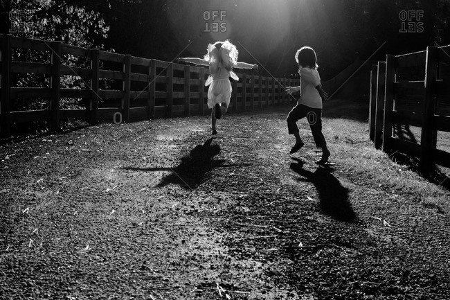2 Kids Running Away