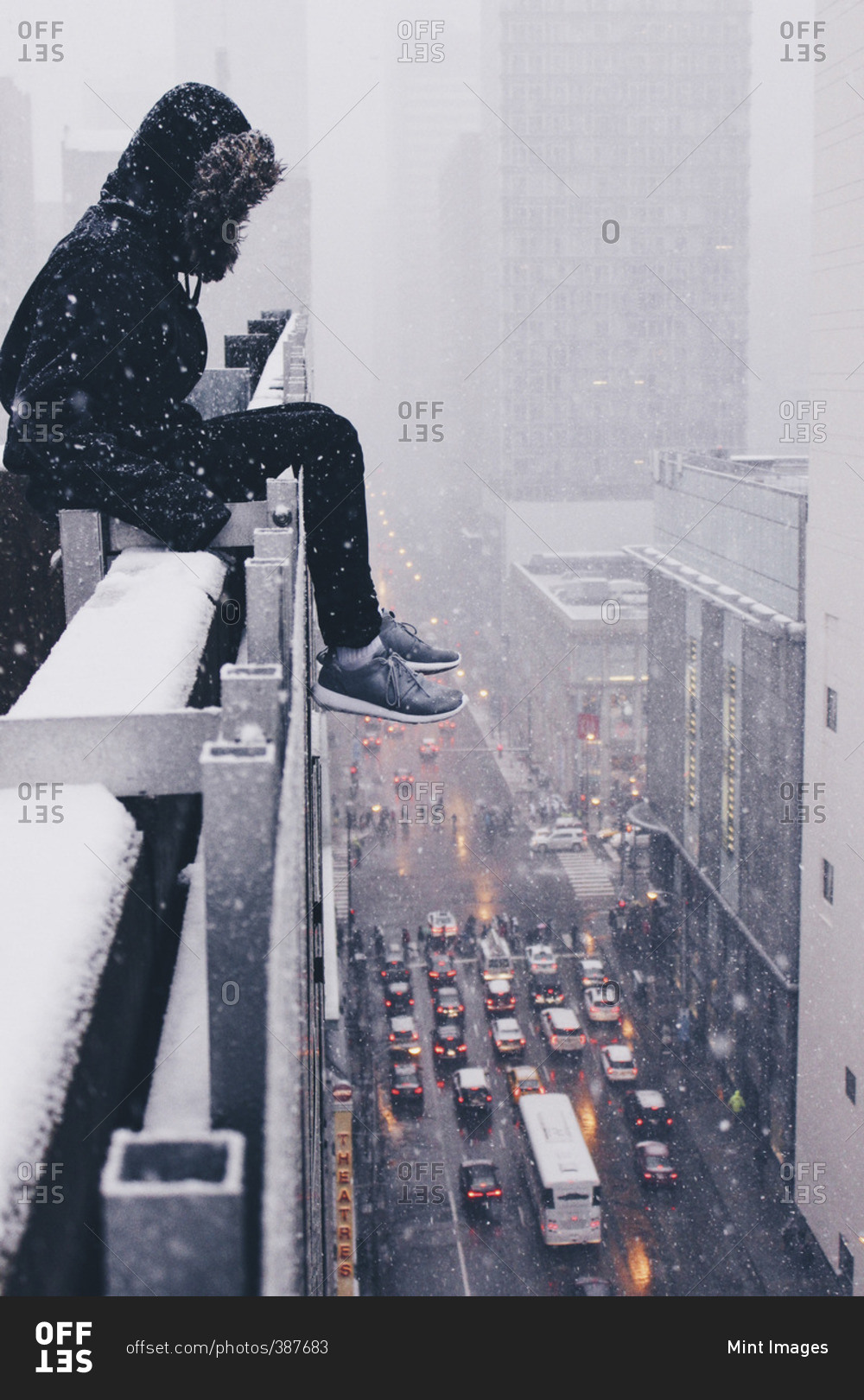 Person Sitting Ledge