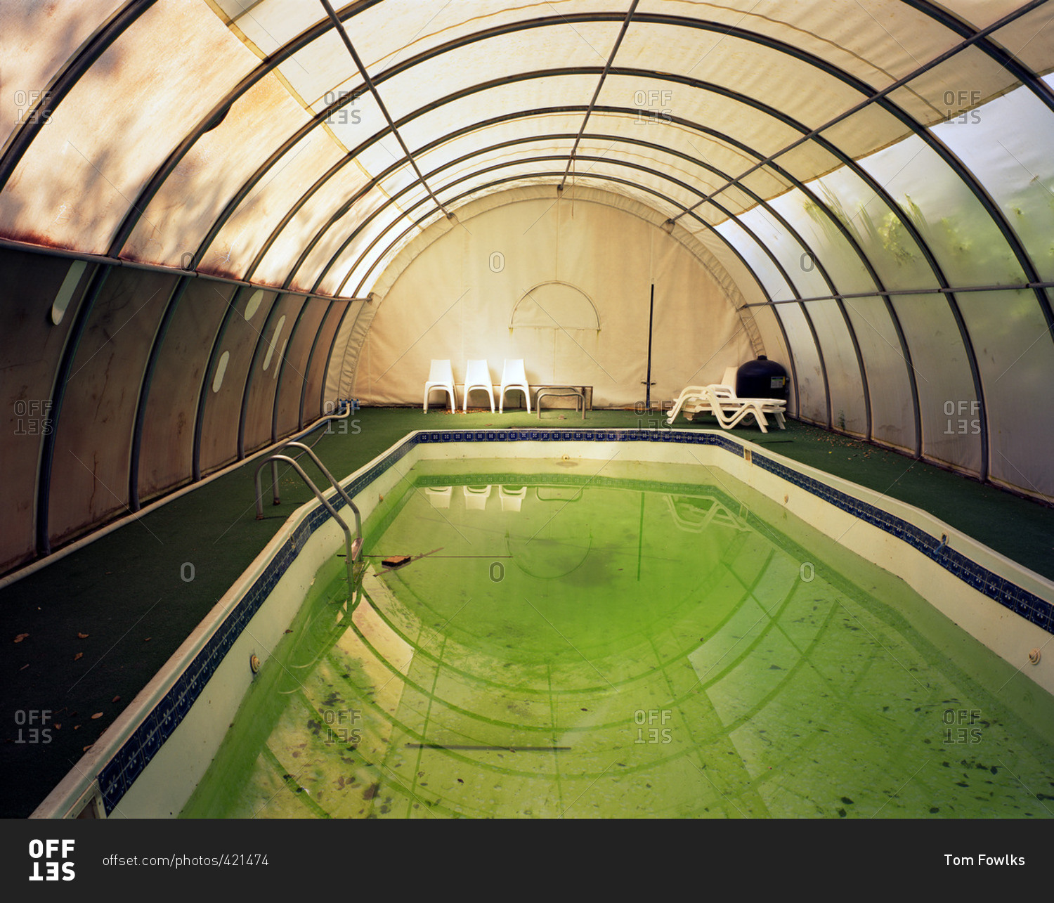 Pool in a Quonset hut stock photo - OFFSET