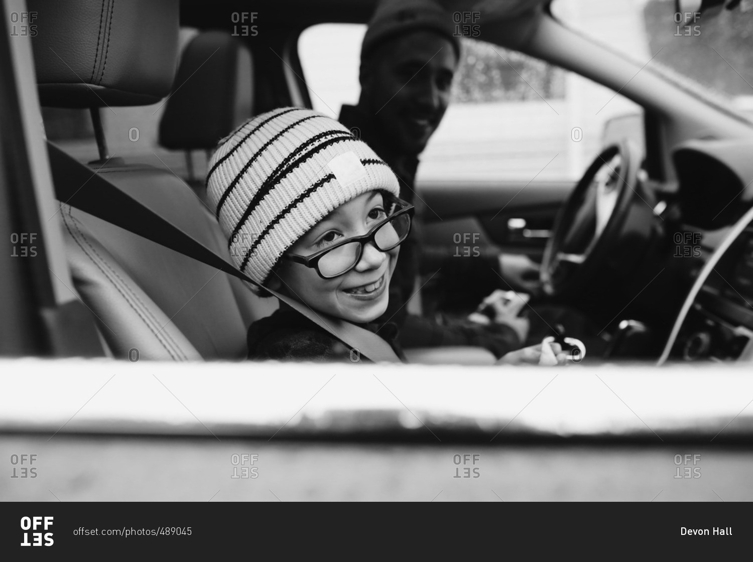 Smiling Child Riding In A Car With His Father Stock Photo OFFSET smiling-child-riding-in-a-car-with-his-father-stock-photo-offset