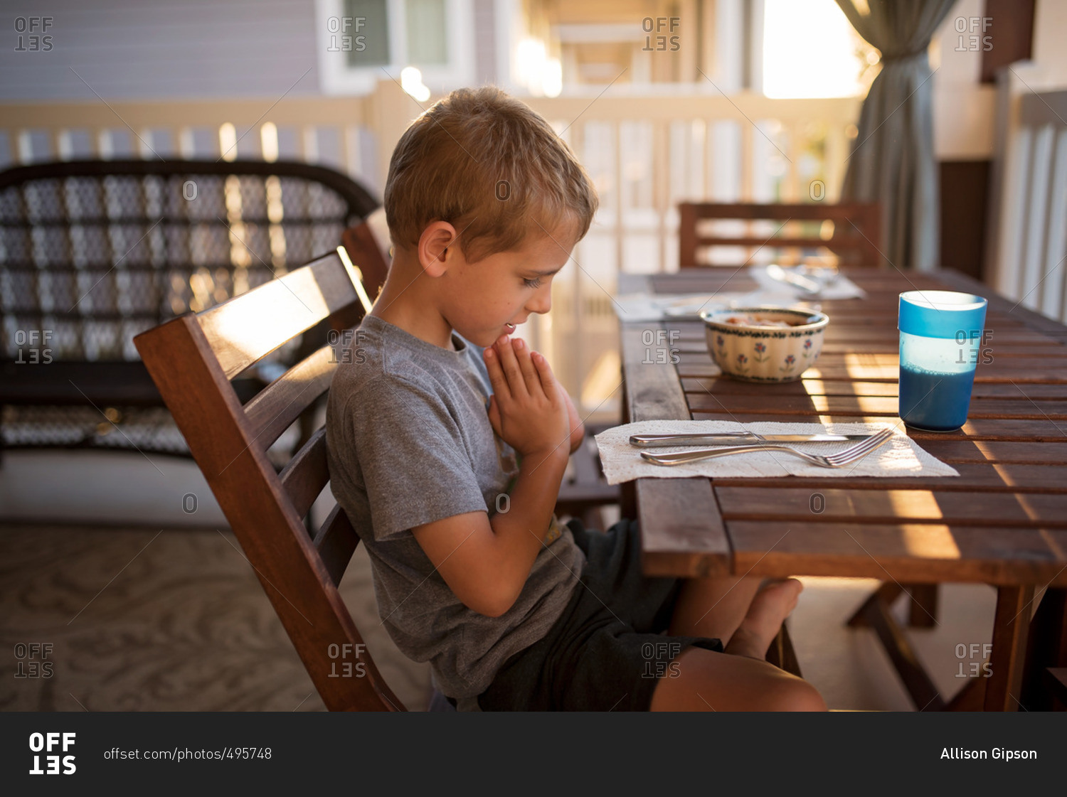 Boy Setting The Table