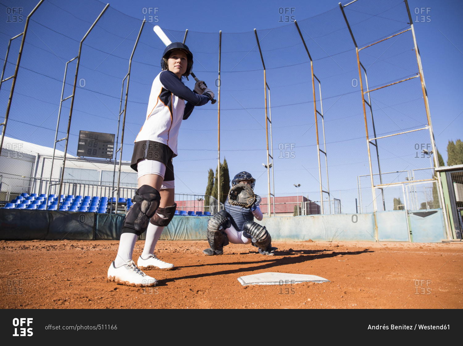 Female batter ready to hit the ball during a baseball game - Stock ...