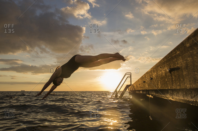 Person Diving Into Ocean