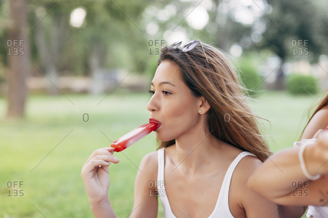 Woman Eating Popsicle