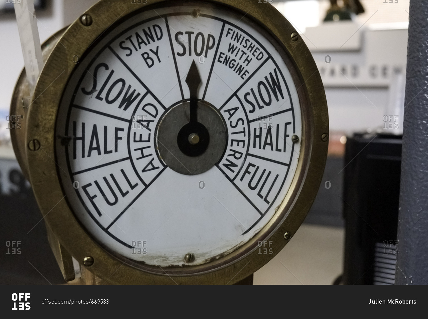 Close up of an antique ship's engine order telegraph stock photo - OFFSET