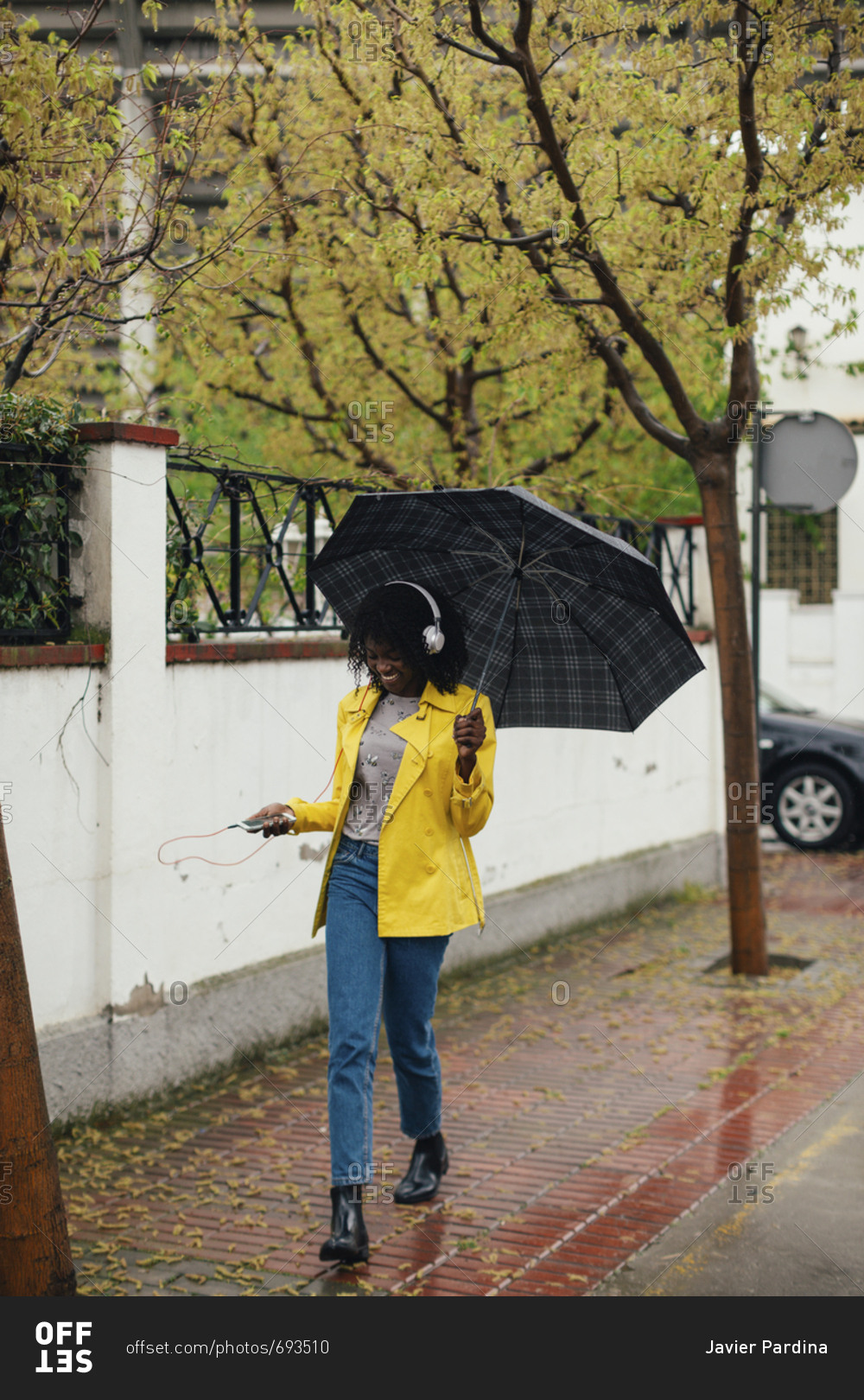Girl Walking In Rain