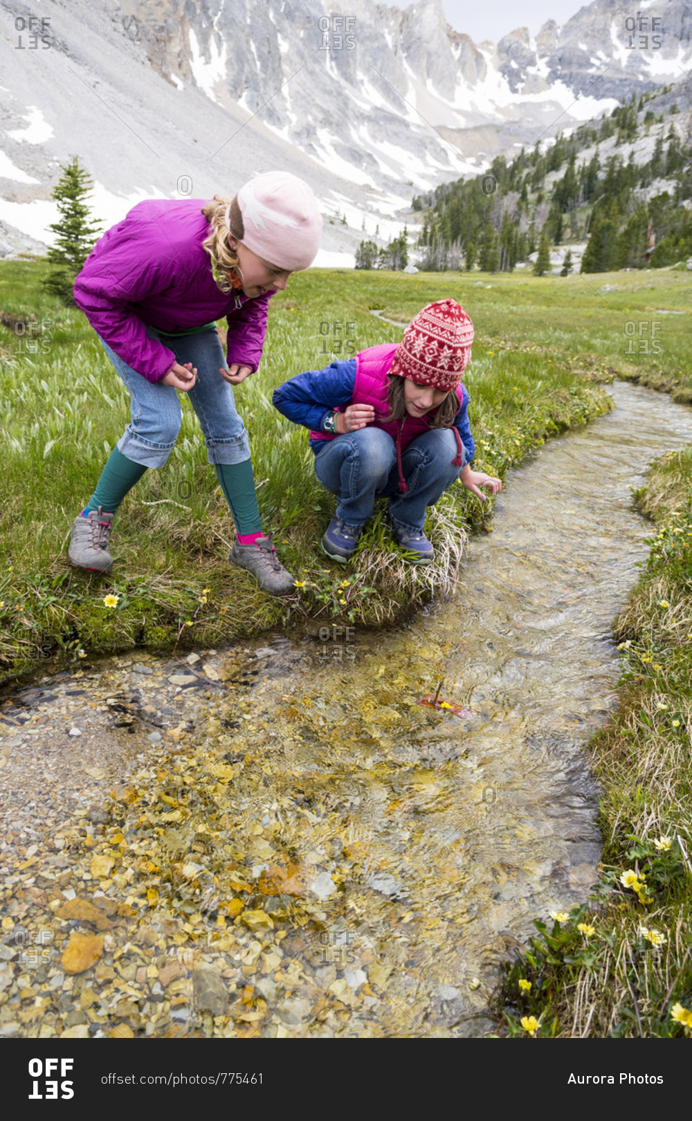 Two girls playing with toy boats in stream, Merriam Lake Basin, Upper ...