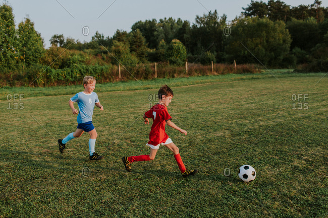 Footballer Chasing The Ball
