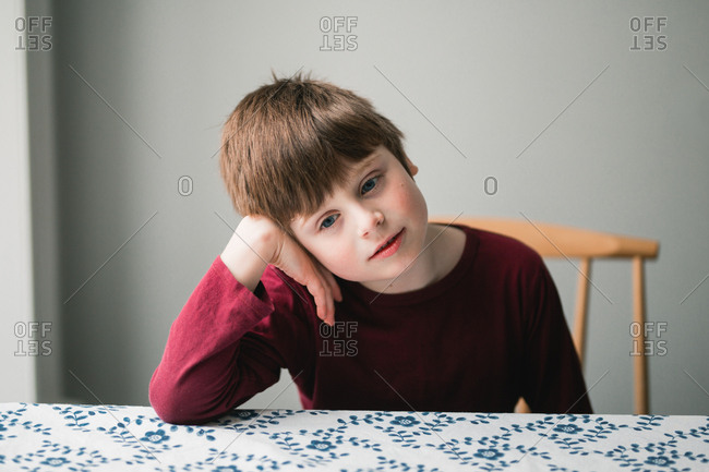 Boy Setting The Table