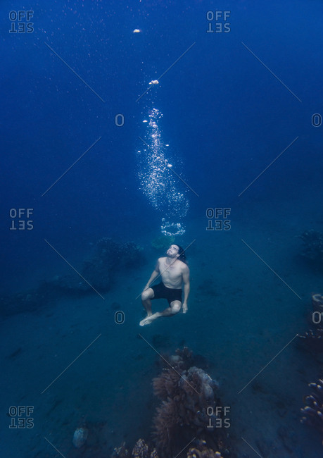 Person Diving Underwater