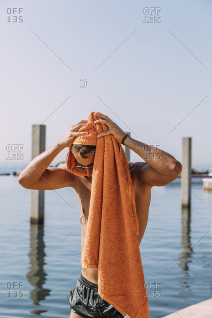 Guy Drying Hair With A Towel