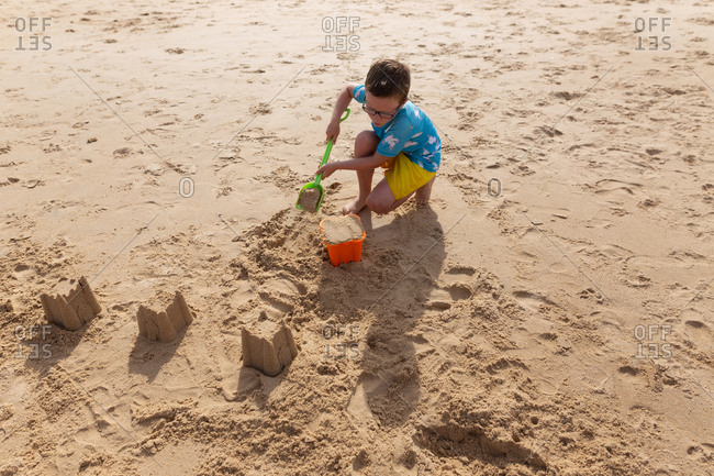 dig sand stock photos - OFFSET