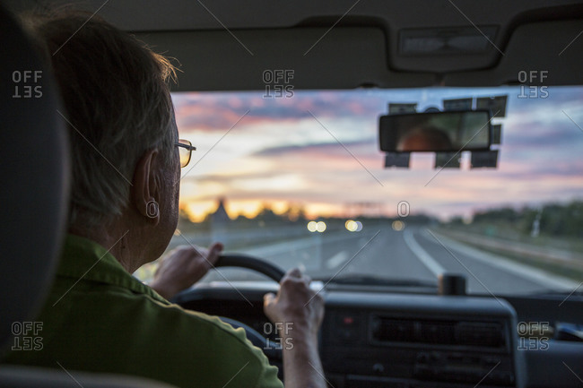 Car Driving On Road Side View