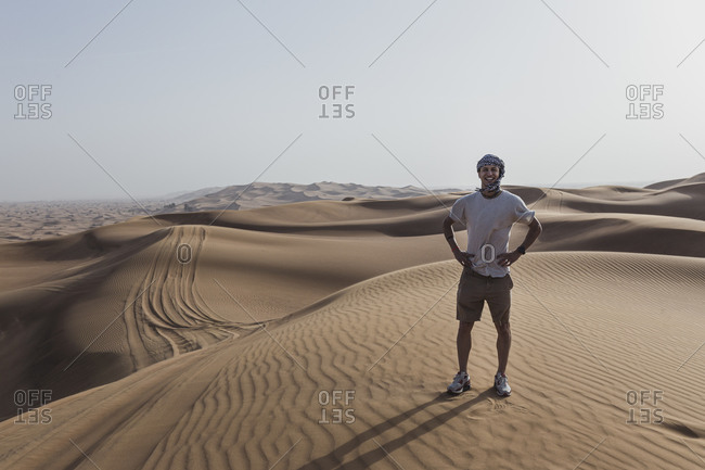 Man Standing Alone In Desert