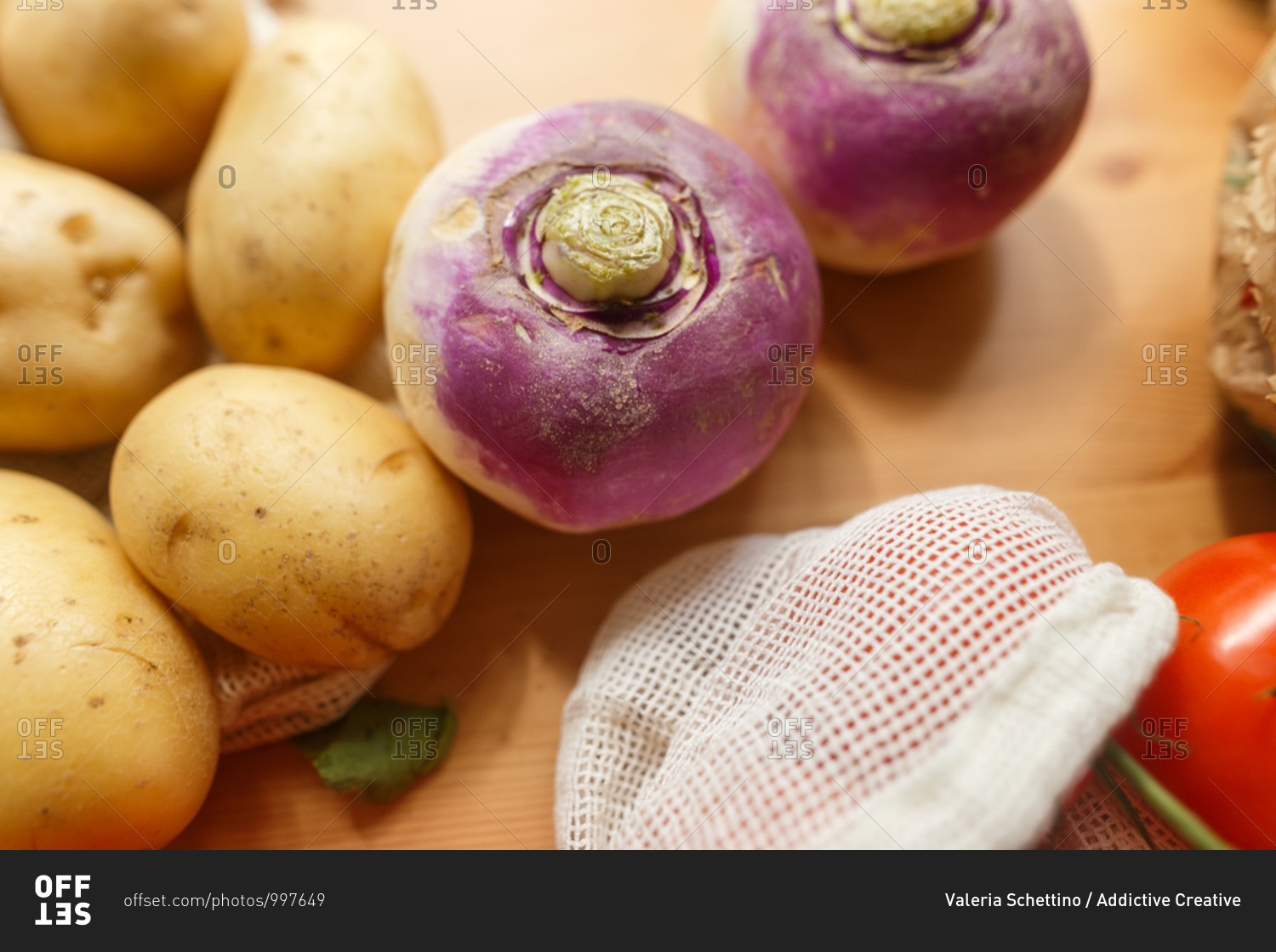 Assorted vegetables and fruits in paper and mesh cotton fabric reusable ...