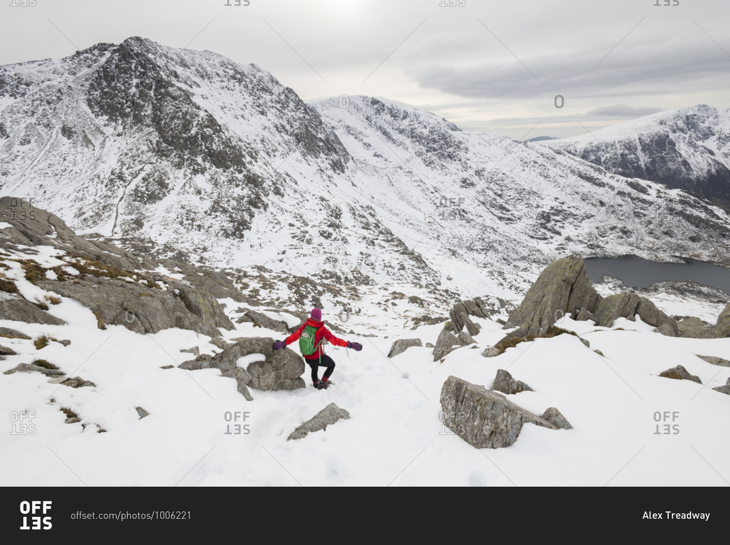 Hiking in deep snow from the top of Tryfan and the Glyders with a view ...