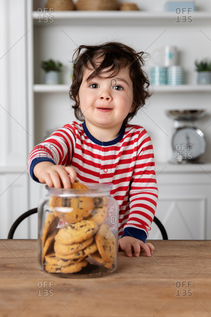 Kid Hand In Cookie Jar