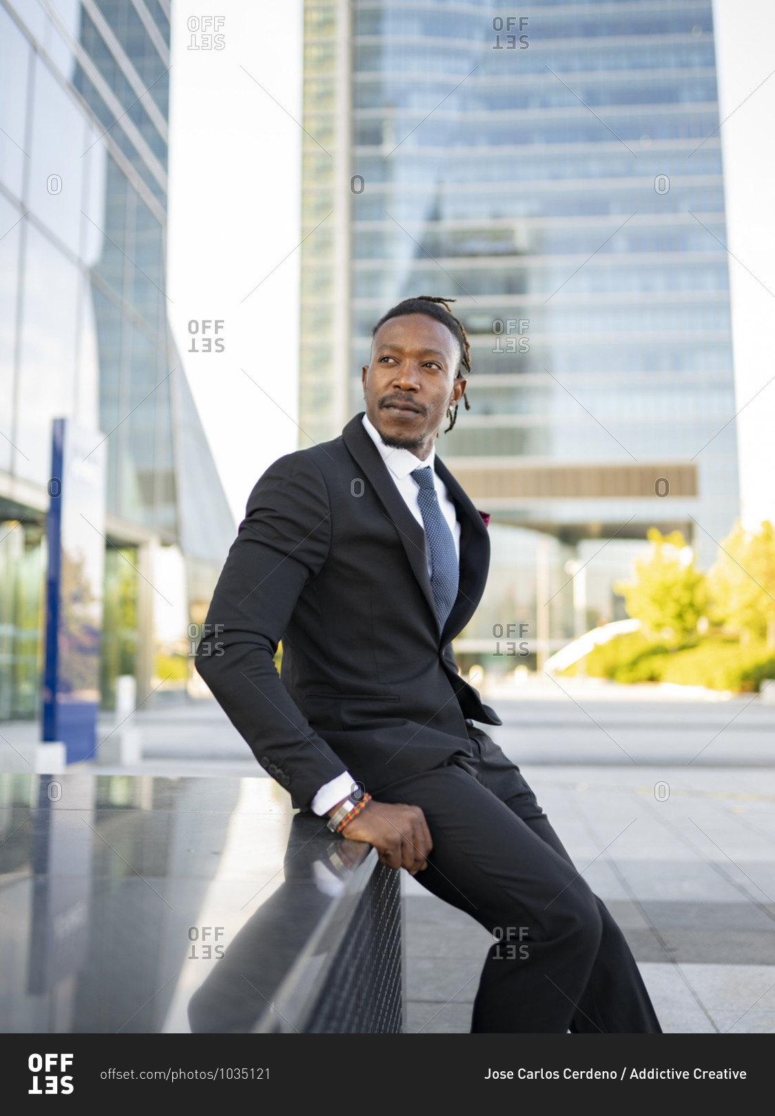 Side view of confident black male executive manager in formal suit ...
