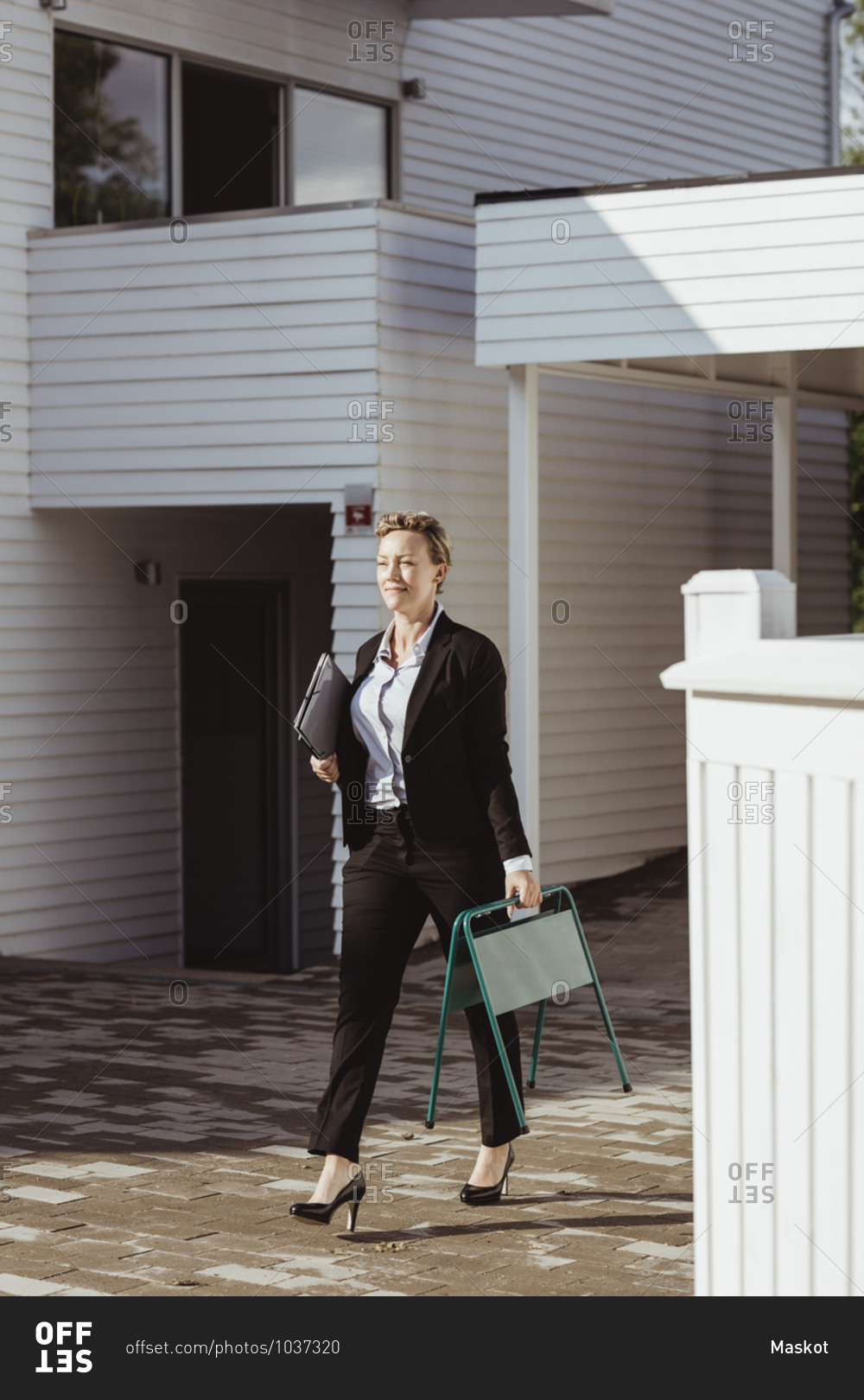 Woman Leaving Home For Work