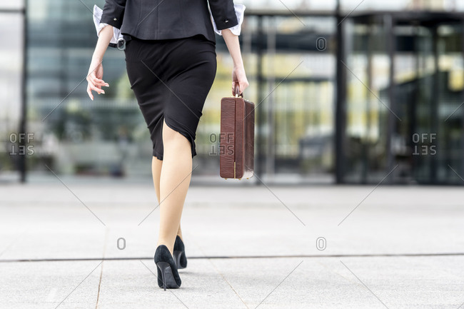 Fast Woman Walking On Street