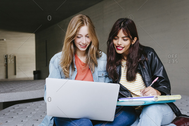 Female Students Using Laptop