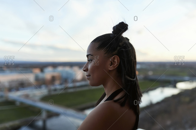 Woman Standing Looking Over Shoulder