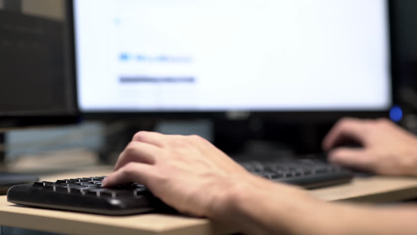 Person Using Desktop Computer with Stock Footage Video (100% Royalty ...