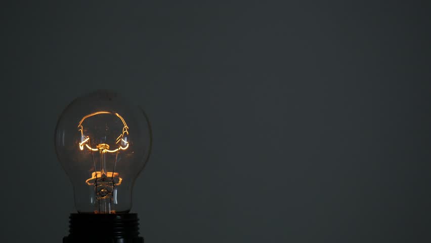 Light Bulb On Black Background, Stock Footage Video (100% Royalty-free ...
