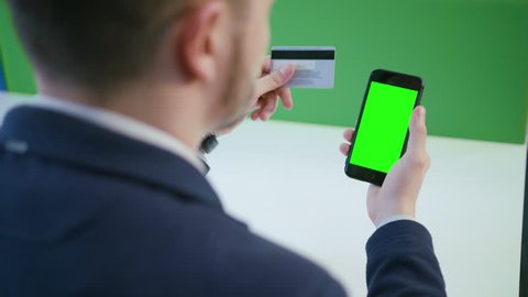Young Man Using Smartphone Green Screen Stock Footage Video (100% ...