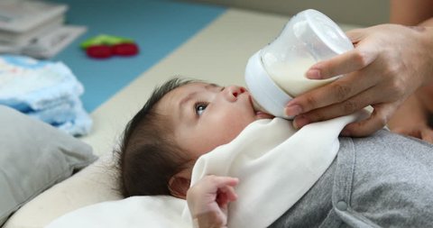 Baby Sucking Milk Bottle Stock Footage Video (100% Royalty-free ...