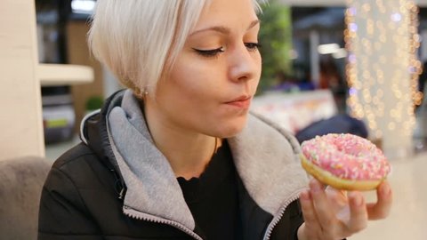 Happy Woman Smelling Donut Smiling Enjoying Stock Footage Video (100% ...