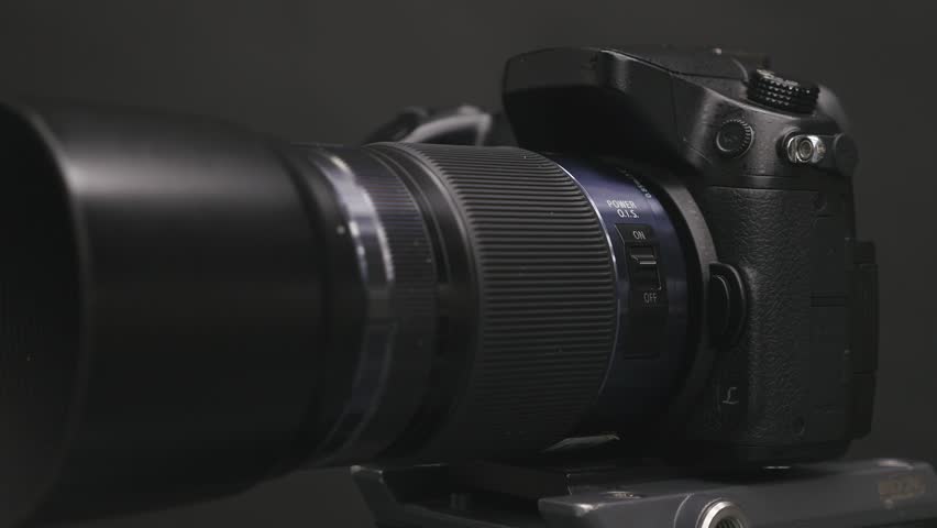 photographer changing lens on camera Stock Footage Video (100% Royalty ...