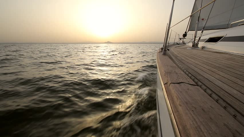 sailing wind through waves during sunset Stock Footage Video (100% ...