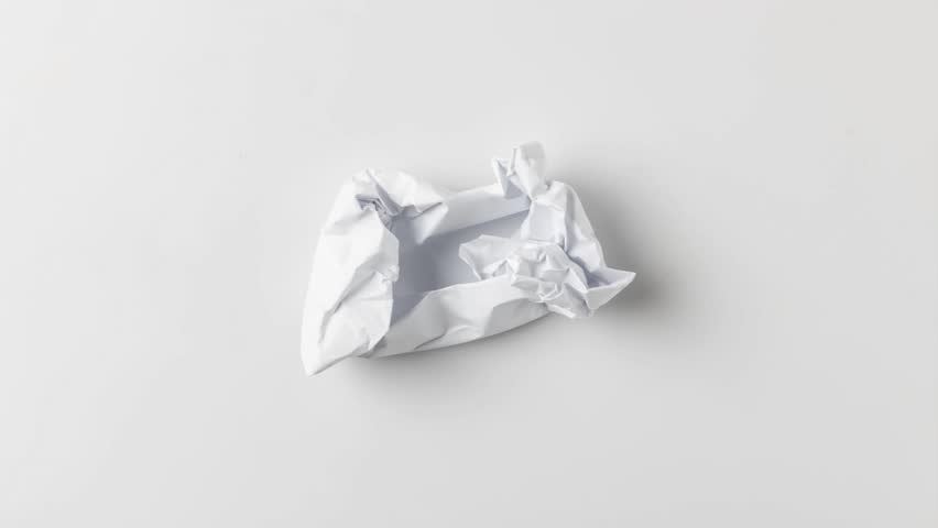 stop motion footage flattening crumpled paper Stock Footage Video (100% ...