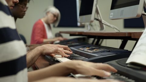 Students Playing Electric Keyboards College Music Stock Footage Video ...