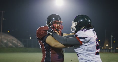 Slow Motion Football Players Fight Stock Footage Video (100% Royalty ...