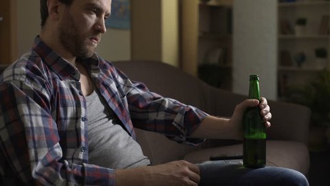 Wasted Guy Sitting On Couch Drinking Stock Footage Video (100% Royalty ...