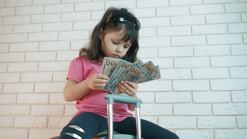child counts money little girl sitting Stock Footage Video (100% ...