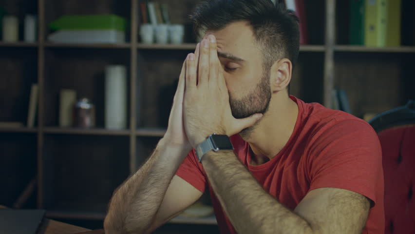 Depressed man hands over face Stock Video Footage - 4K and HD Video ...